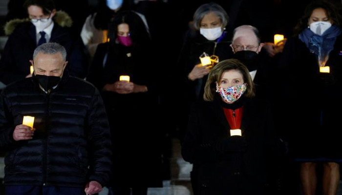 Democrats hold candle light March on Capitol riots anniversary
