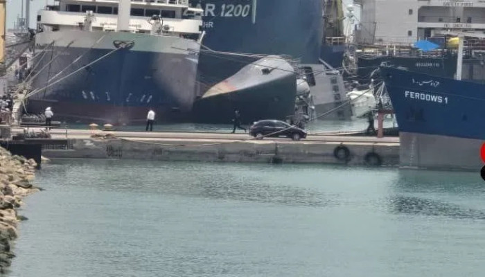 Iranian warship Sahand capsizes in dock after accident