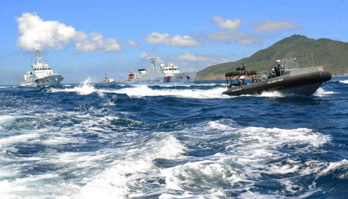 China warns and drives Japanese fishing boat from contested waters near ...